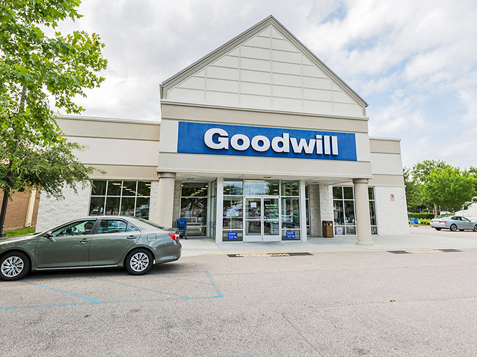 Goodwill's clean lines and bright signage welcome shoppers like old friends. Where retail therapy meets actual therapy for your wallet.