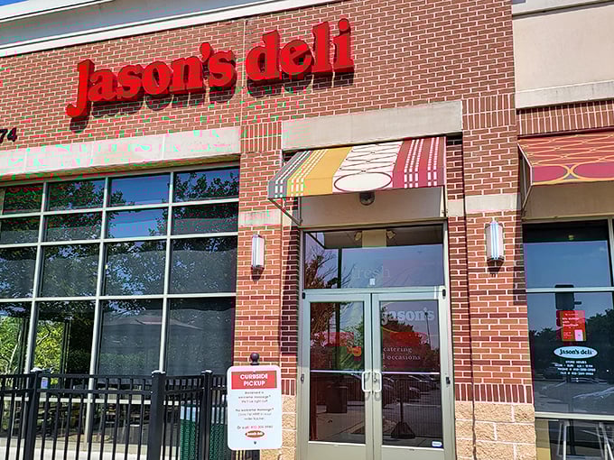 Jason's Deli's bold red lettering stands out against the brick backdrop. Clean lines and bright windows hint at the fresh fare inside!