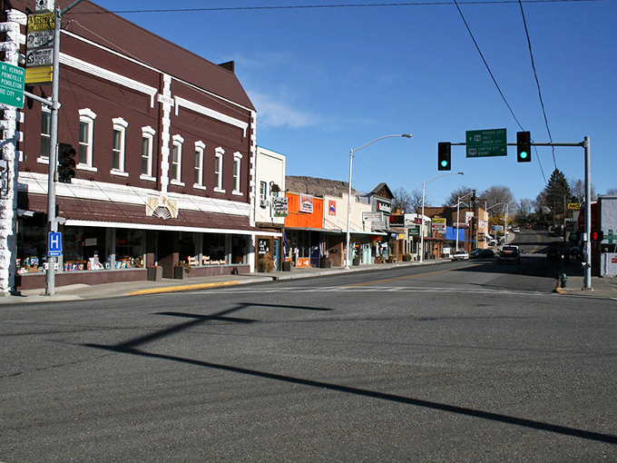 Historic brick buildings line streets where the Old West meets modern convenience in perfect harmony.