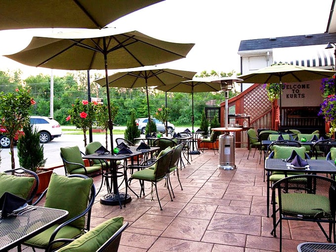 Kurt's inviting patio whispers "stay awhile" while promising steaks that'll make you want to become a regular immediately.