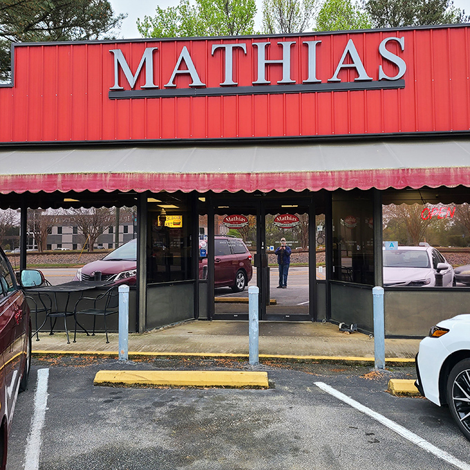 That red awning beckons like a matador's cape for the sandwich-hungry masses.