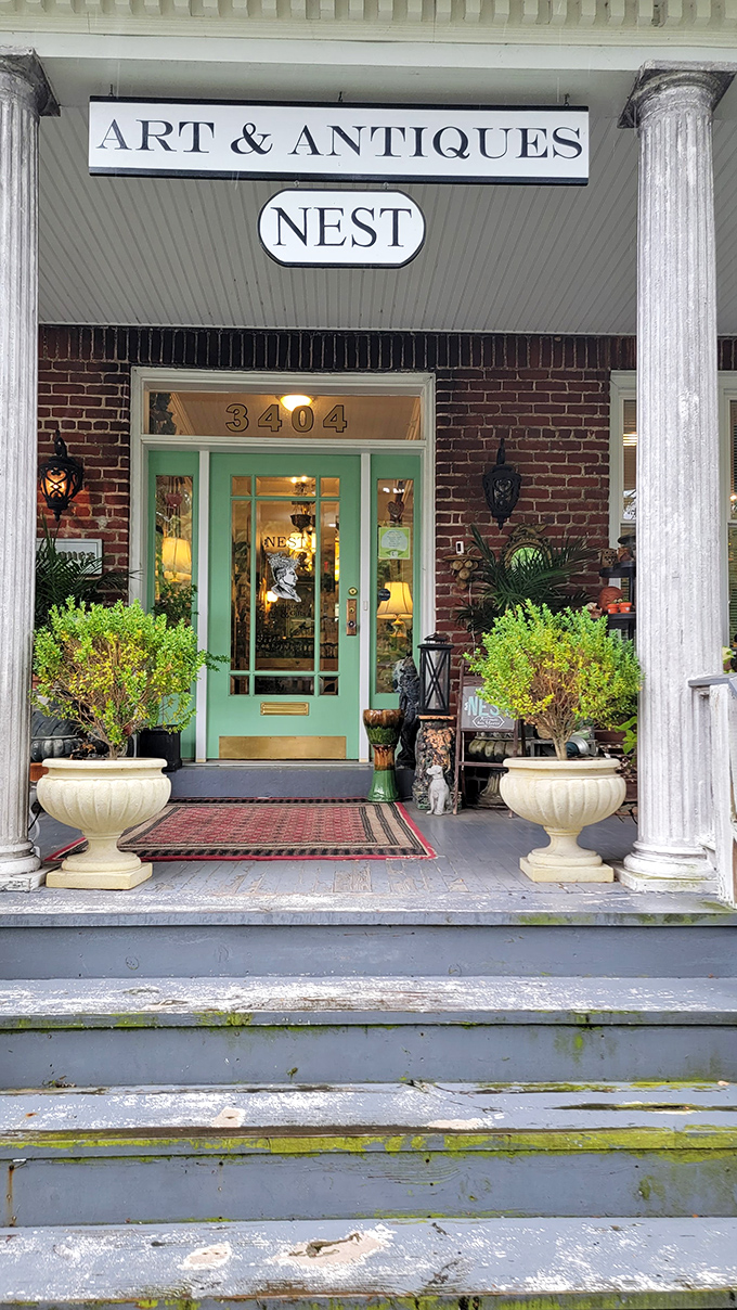 Nest's mint-green door between classic columns looks like it belongs on a magazine cover, not just on your Instagram feed.