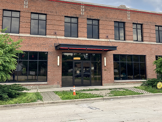 Papa Del's modern brick exterior can't hide the old-school pizza magic happening behind those big windows every night.