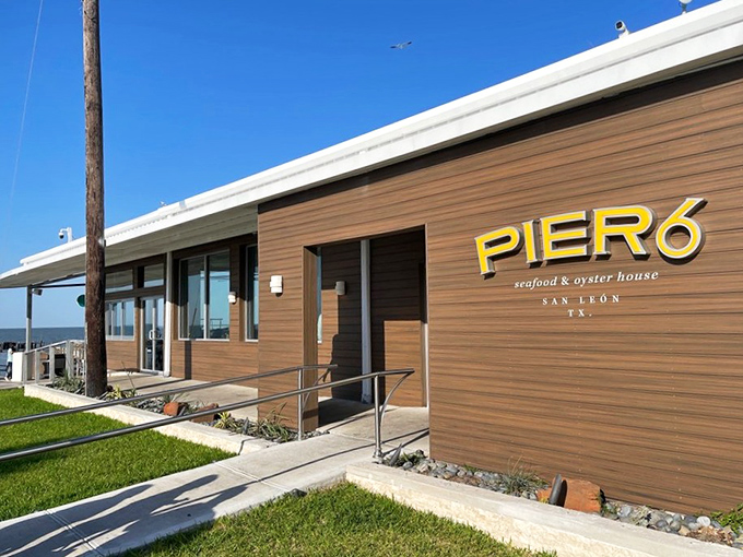 Pier 6's modern wooden fa&ccedil;ade brings contemporary cool to traditional seafood. Sleek outside, soulful seafood inside!