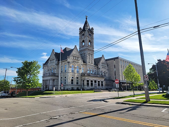 Sunlight dances on the courthouse’s limestone walls as Port Washington’s golden eagle keeps watch over history.