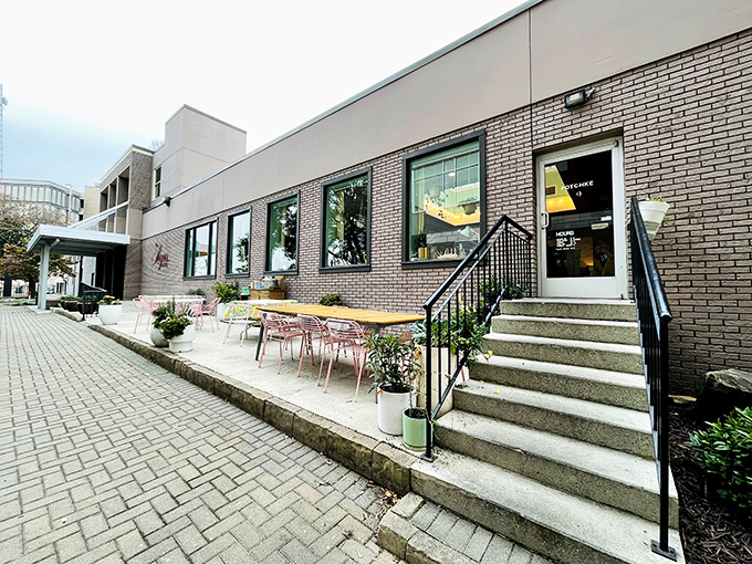 Brick and glass blend beautifully, creating an urban oasis for serious sandwich enthusiasts.