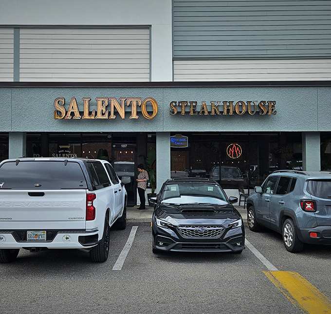 Salento's golden lettering shines like a beacon for meat lovers. This Jacksonville gem proves great steakhouses don't need to look like log cabins.