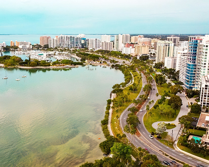 Sarasota's bayfront skyline gleams like a jewel box opened under Florida's perpetually generous sunshine.