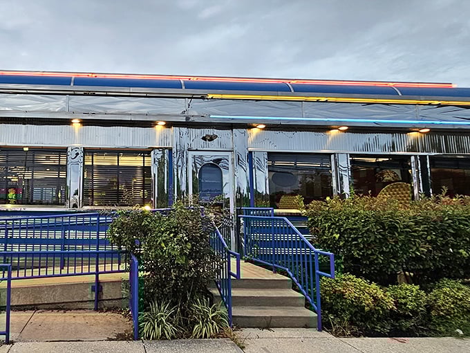 This chrome diner car gleams like a breakfast spaceship that landed perfectly on Pulaski Highway.