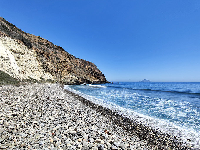 Smugglers Cove is a remote island escape where rugged cliffs and rolling surf speak louder than words ever could.