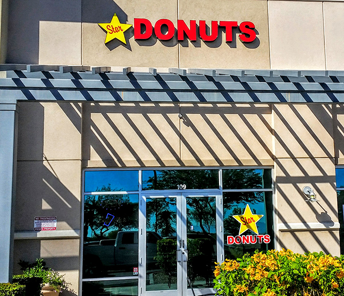 Star Donuts shines bright with that cheerful yellow star, promising stellar treats inside. 