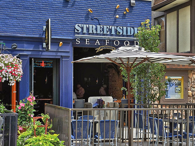 Streetside's vibrant blue exterior stands proudly among Birmingham's upscale shops, promising fresh oceanic treasures within.