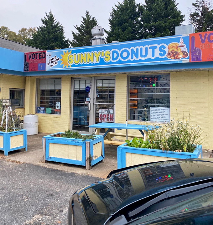 Sunny's Donuts' bright blue and yellow exterior radiates the same joy you'll feel after tasting their amazing creations.