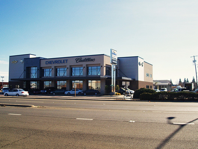 Vintage main street charm captured in living color, like stepping into a Norman Rockwell painting.