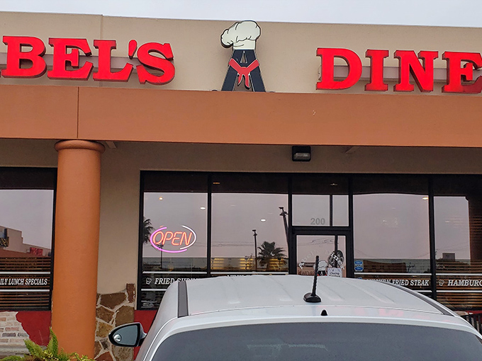 The chef on Abel's sign seems to be winking, as if sharing a secret about their legendary breakfast.