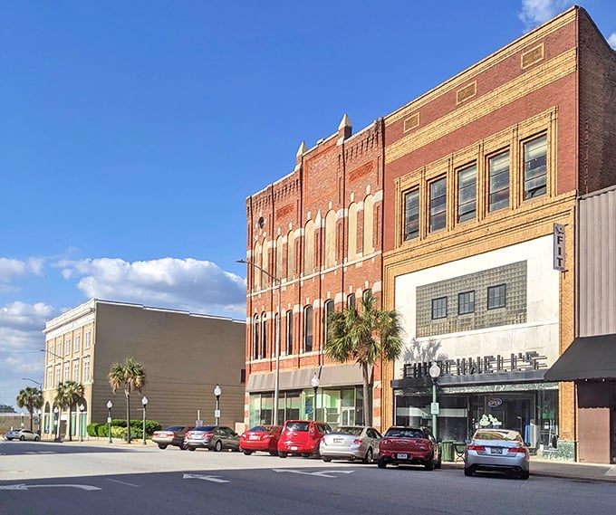 Classic brick buildings line streets where Southern charm meets affordable living and everyone wins big.