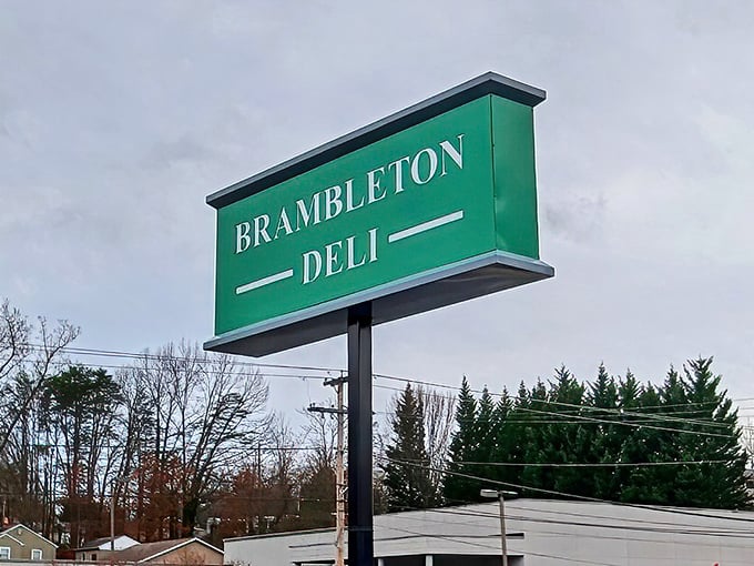 The green sign stands tall and proud, marking this neighborhood gathering place for sandwich lovers far and wide.