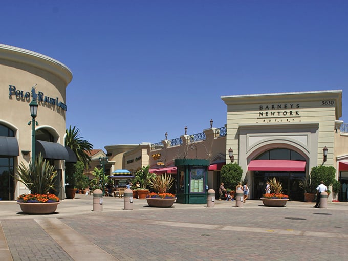 The mountain backdrop at Carlsbad Outlets turns a simple shopping trip into a scenic adventure. Those aren't just stores&mdash;they're treasure chests!