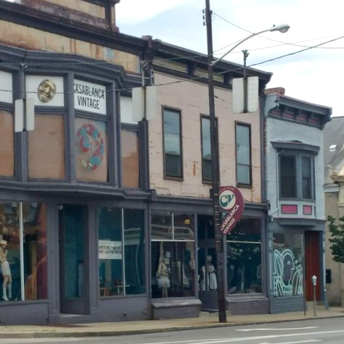Mannequins stand sentinel in Casablanca's windows, modeling decades of style history for modern vintage hunters to discover.