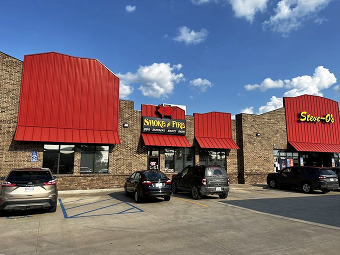 That sleek red exterior houses smokers that work overtime, turning out barbecue that makes the whole neighborhood jealous.