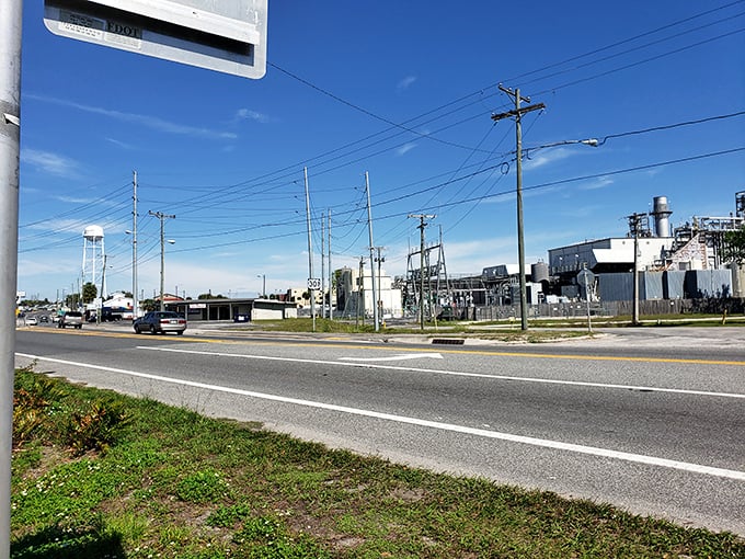 Where water towers rise above busy roads and industry hums alongside everyday life.