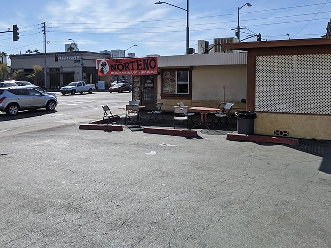 Simple tables outside El Norte&ntilde;o offer the perfect spot to savor chimichanga perfection. Sometimes the best treasures come in unassuming packages!