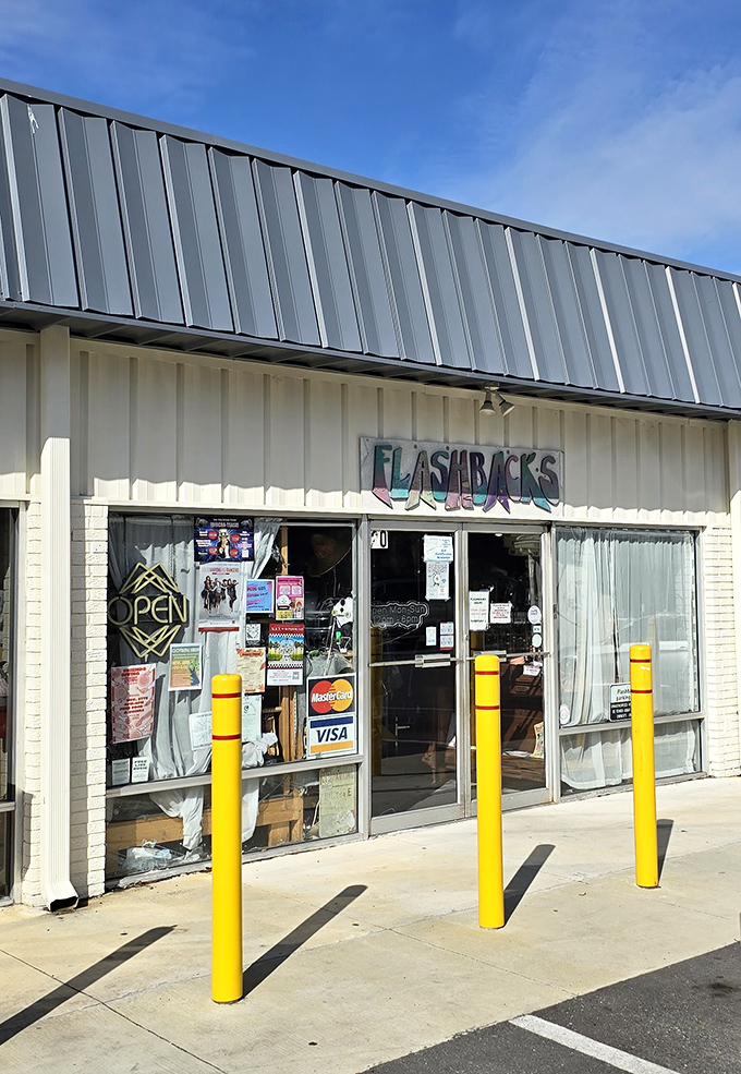 The updated Flashbacks storefront maintains its vintage charm with a modern twist. Those yellow bollards guard fashion gold within!