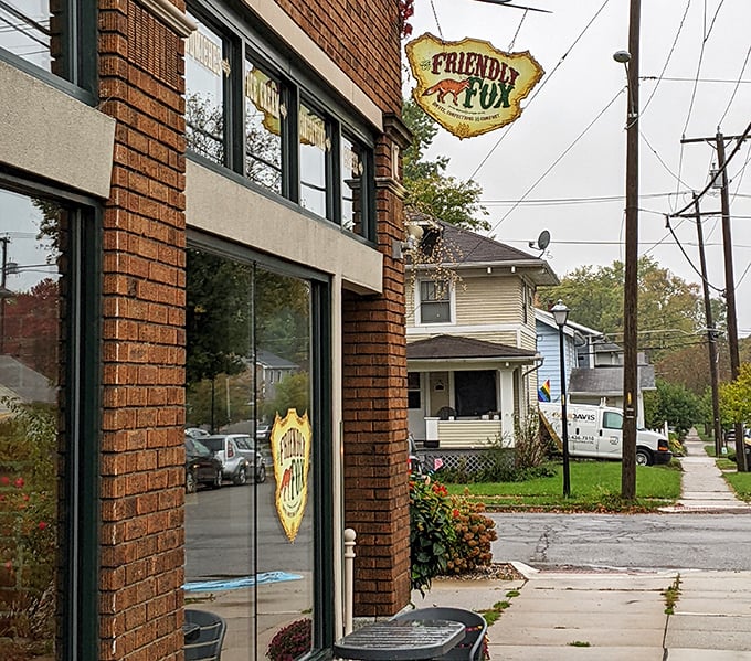 Charming sidewalk planters and welcoming entrance promise the neighborhood gathering spot every community deserves.