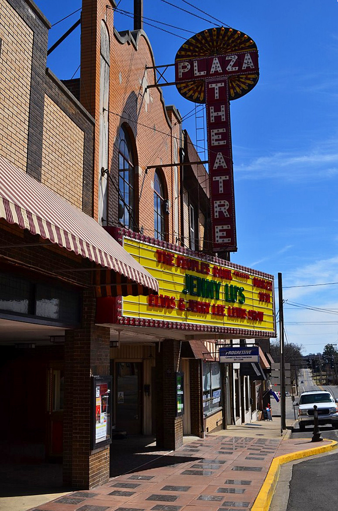 The vintage Plaza Theatre marquee brightens the streetscape, a nostalgic reminder of simpler times when movies cost a quarter.