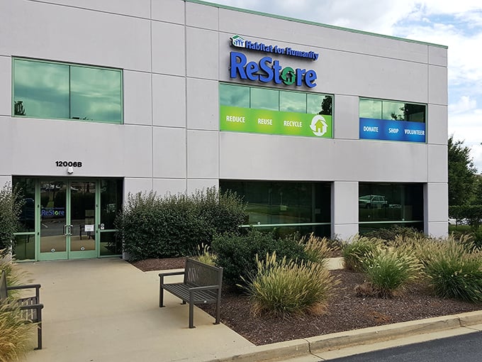 Modern landscaping and clean architecture signal a fresh approach to construction surplus and furniture finds.