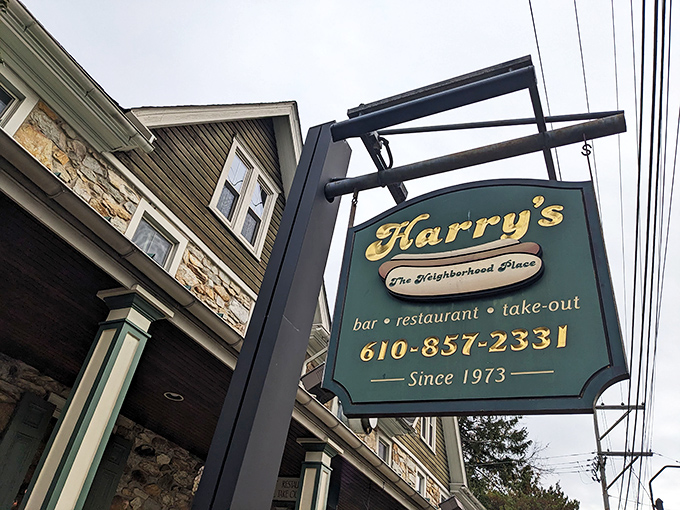Hanging signs like this one whisper "local favorite" to anyone with eyes for authentic eats.