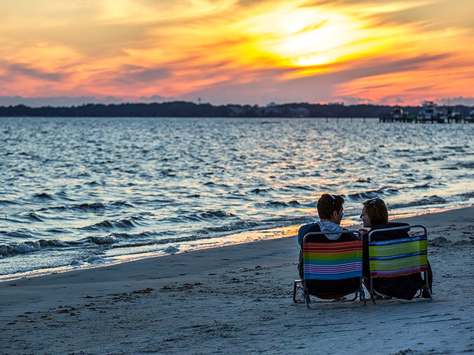Golden sunsets paint the sky while couples enjoy beaches that prove paradise doesn't have to cost a fortune.