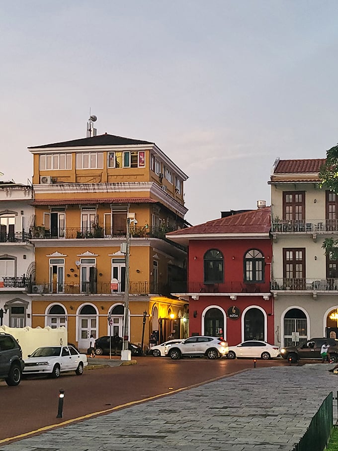 Colorful buildings line historic streets like a rainbow painted by optimistic artists.