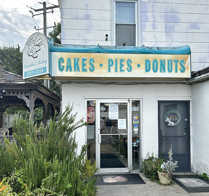 That vintage "Cakes • Pies • Donuts" sign is the most honest advertising you'll see all day.