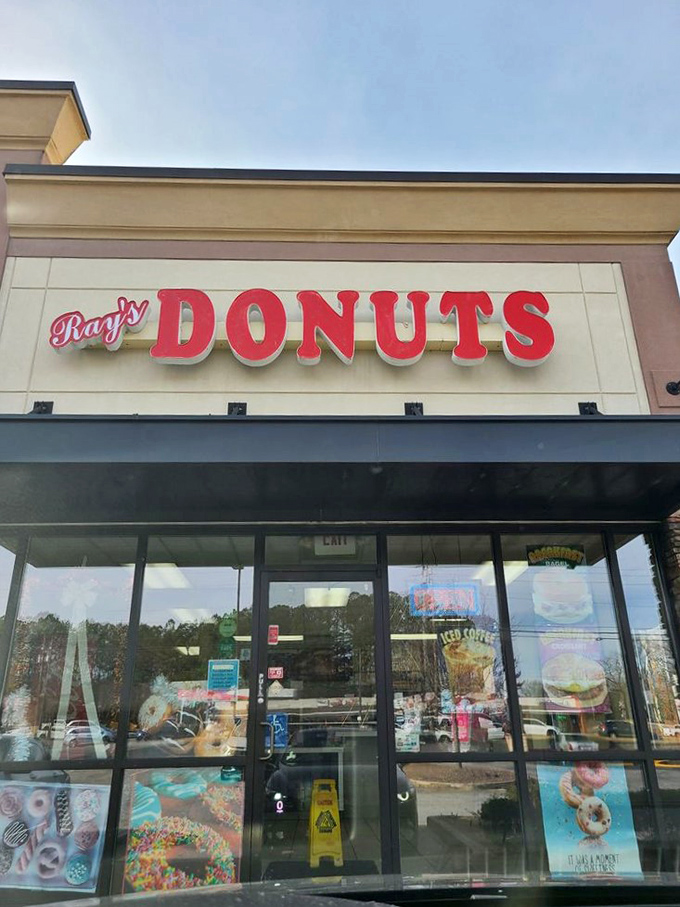 Ray's bright red sign promises a splash of joy in your morning routine. Some traditions are worth maintaining, especially the delicious ones.