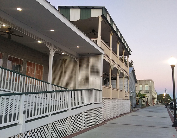 Wraparound porches and coastal elegance make every dinner feel like a special occasion worth celebrating.