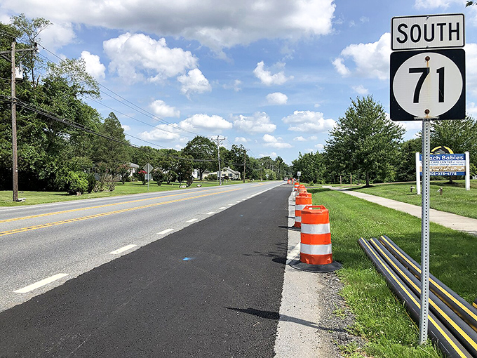 Route 71 cuts through Townsend's green landscape, where road construction moves at the same unhurried pace as everything else.