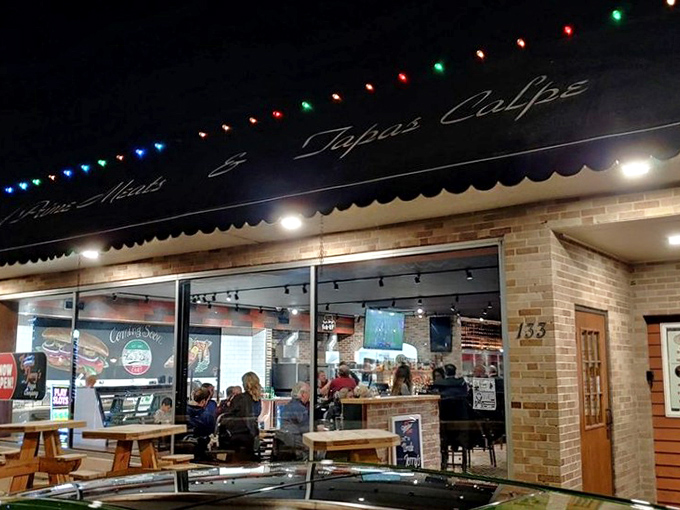 Festive lights suggest this place knows how to celebrate the simple joy of great pizza.