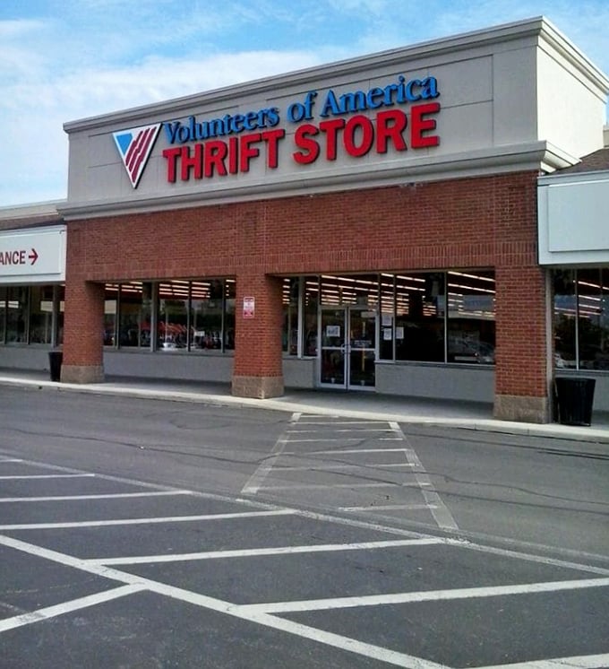 Rain-slicked parking lot leads to a thrift wonderland where one person's discards become another's treasures.