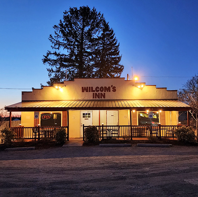 As twilight falls, Wilcom's Inn glows with promise&mdash;a beacon for those who know that legendary steaks often hide in the most ordinary-looking places.Add to Conversation