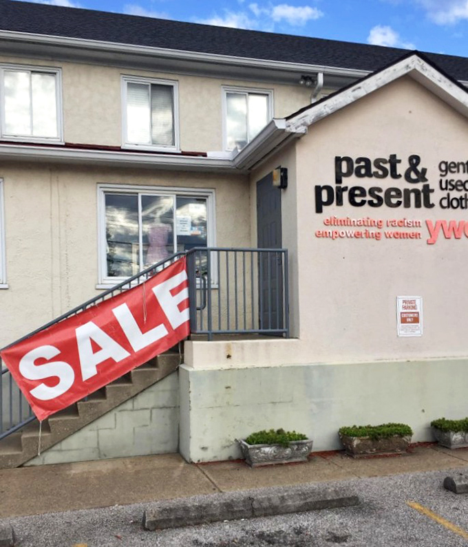 YWCA's mission statement right on the wall—shopping with purpose never looked so good. Fashion that empowers more than just your wardrobe!