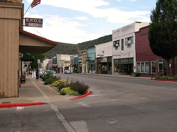 Victorian storefronts and mountain backdrops create the perfect setting for budget-conscious golden years.