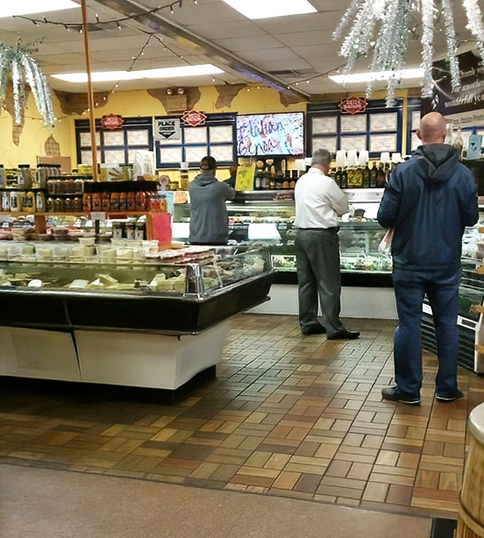 Inside T & F, where the deli counter gleams like a shrine to cured meats and cheese perfection.