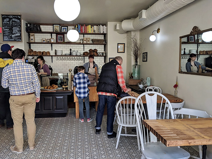 Inside, minimalist d&eacute;cor lets the baked goods be the stars, while the patterned floor tiles add just enough character to make you feel at home.