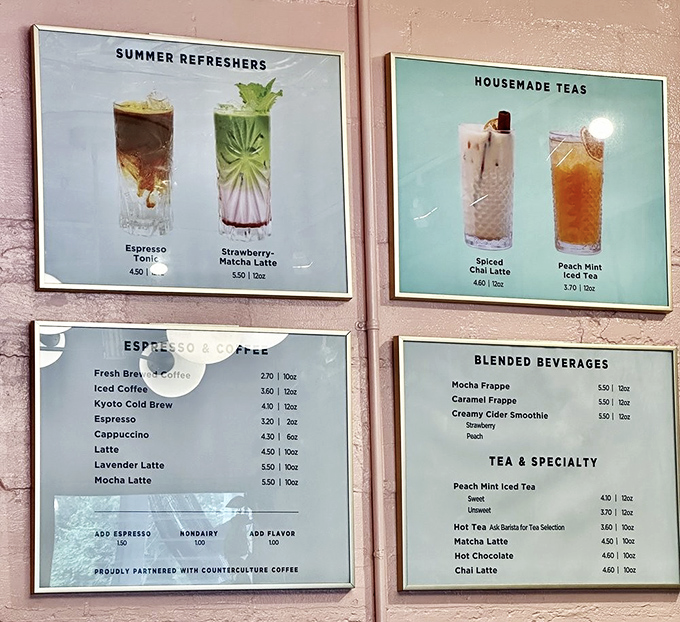 Coffee connoisseurs rejoice! The menu board showcases everything from classic cappuccinos to summer refreshers that could make even the most dedicated iced tea drinker switch allegiances.