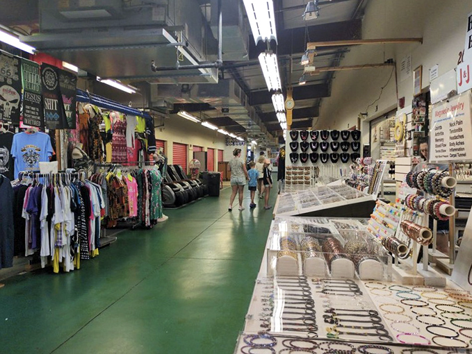 Rows of colorful merchandise create a retail canyon where shoppers navigate the thrilling terrain of potential discoveries.