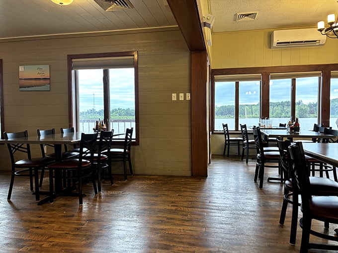 Sunlight streams through windows framing West Boggs Lake, creating the perfect backdrop for conversations that linger as long as the memorable flavors.