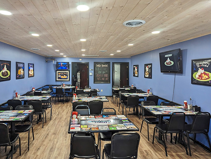 Step inside to a world where wood-paneled ceilings and blue walls create the perfect backdrop for comfort food conversations and ice cream revelations.