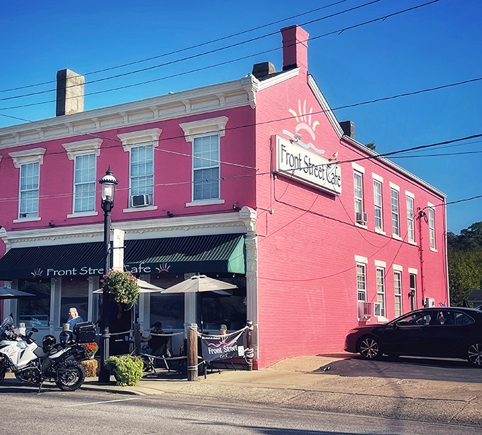 The pink building isn't just eye-catching&mdash;it's a beacon for hungry travelers. Front Street Caf&eacute;'s historic charm stands out in New Richmond like a culinary landmark.