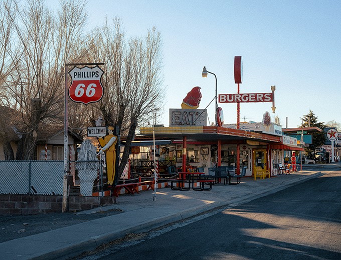 The iconic exterior of Delgadillo's Snow Cap stands as a colorful sentinel on Route 66, where kitsch meets culinary delight in the Arizona desert.